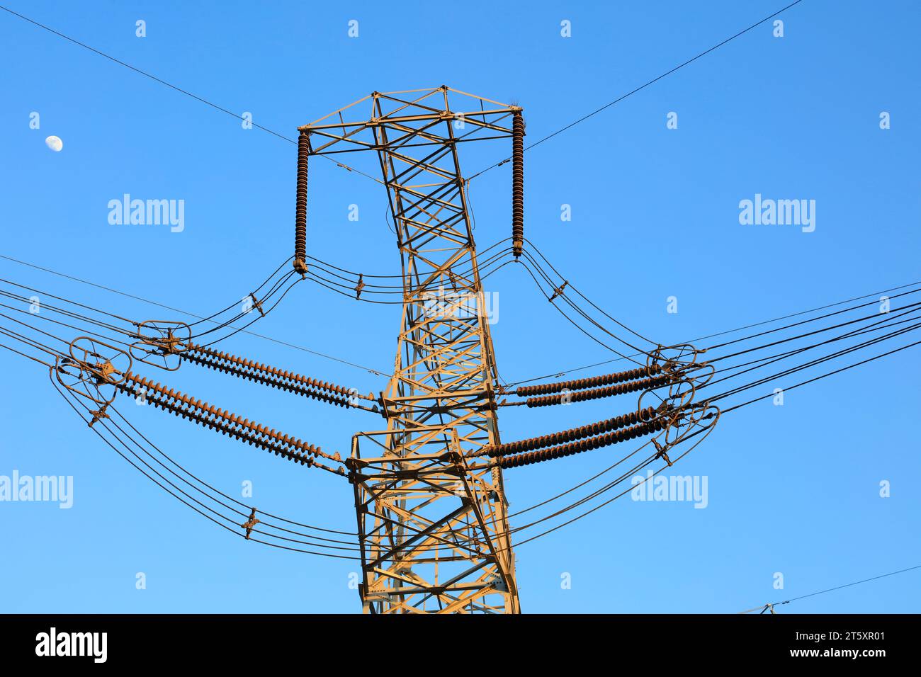 Electric power tower in blue sky Stock Photo - Alamy