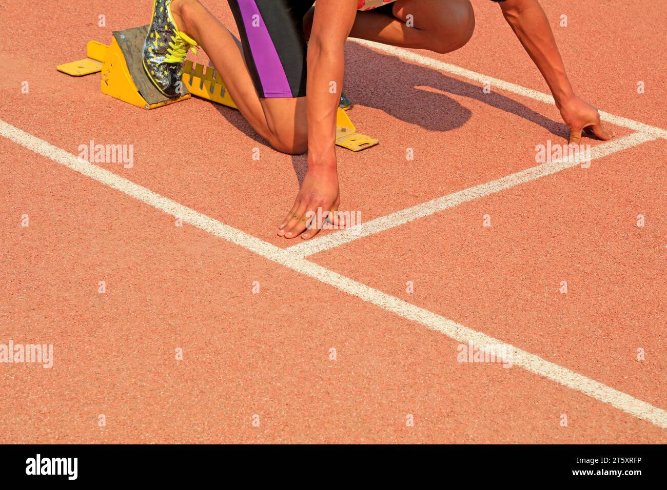 starting block and short distance runner Stock Photo - Alamy