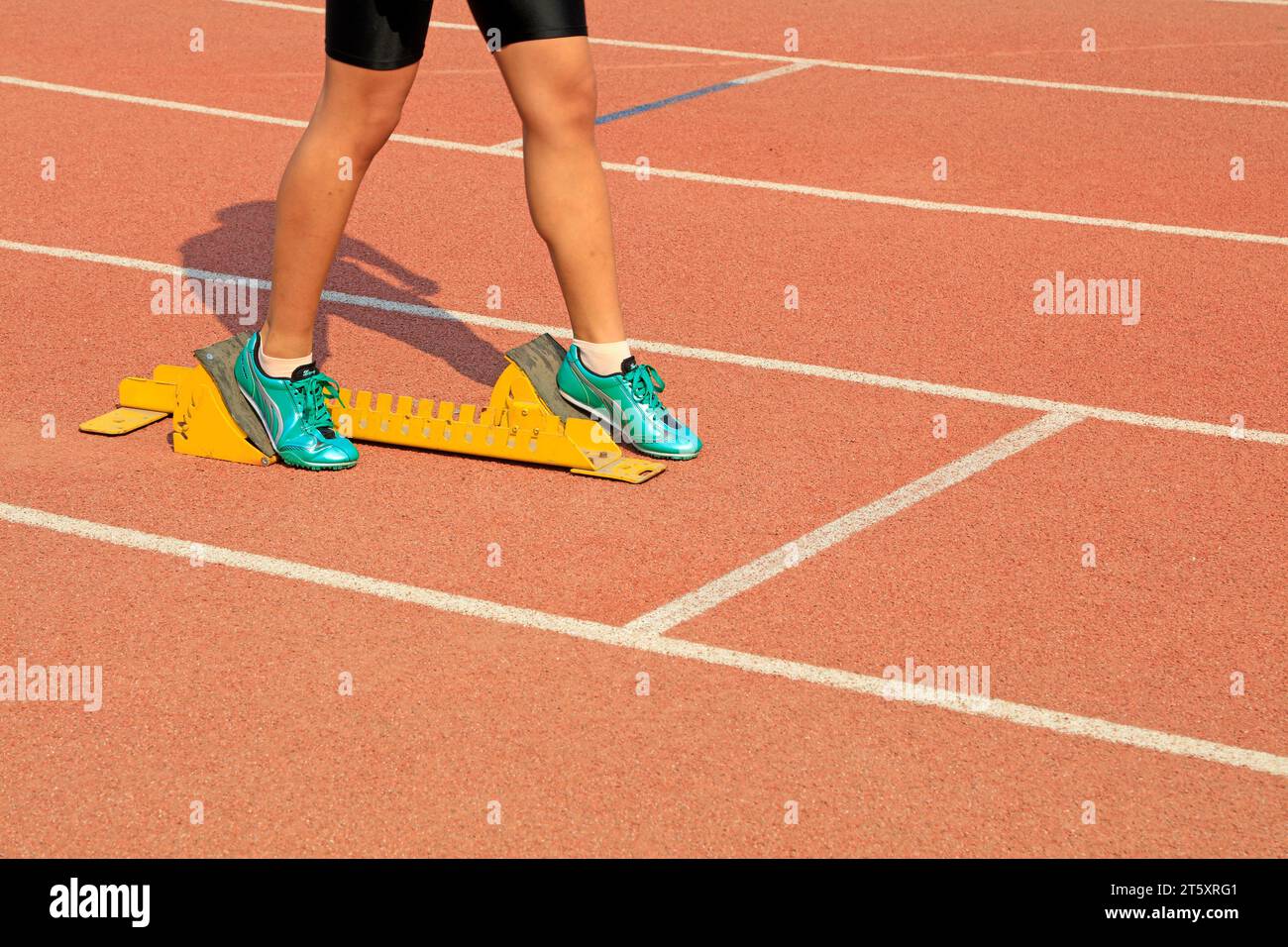 starting block and short distance runner Stock Photo - Alamy