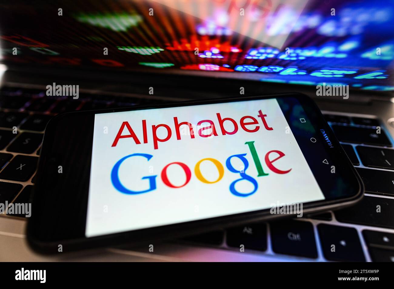 In this photo illustration, an Alphabet Google logo is displayed on a ...