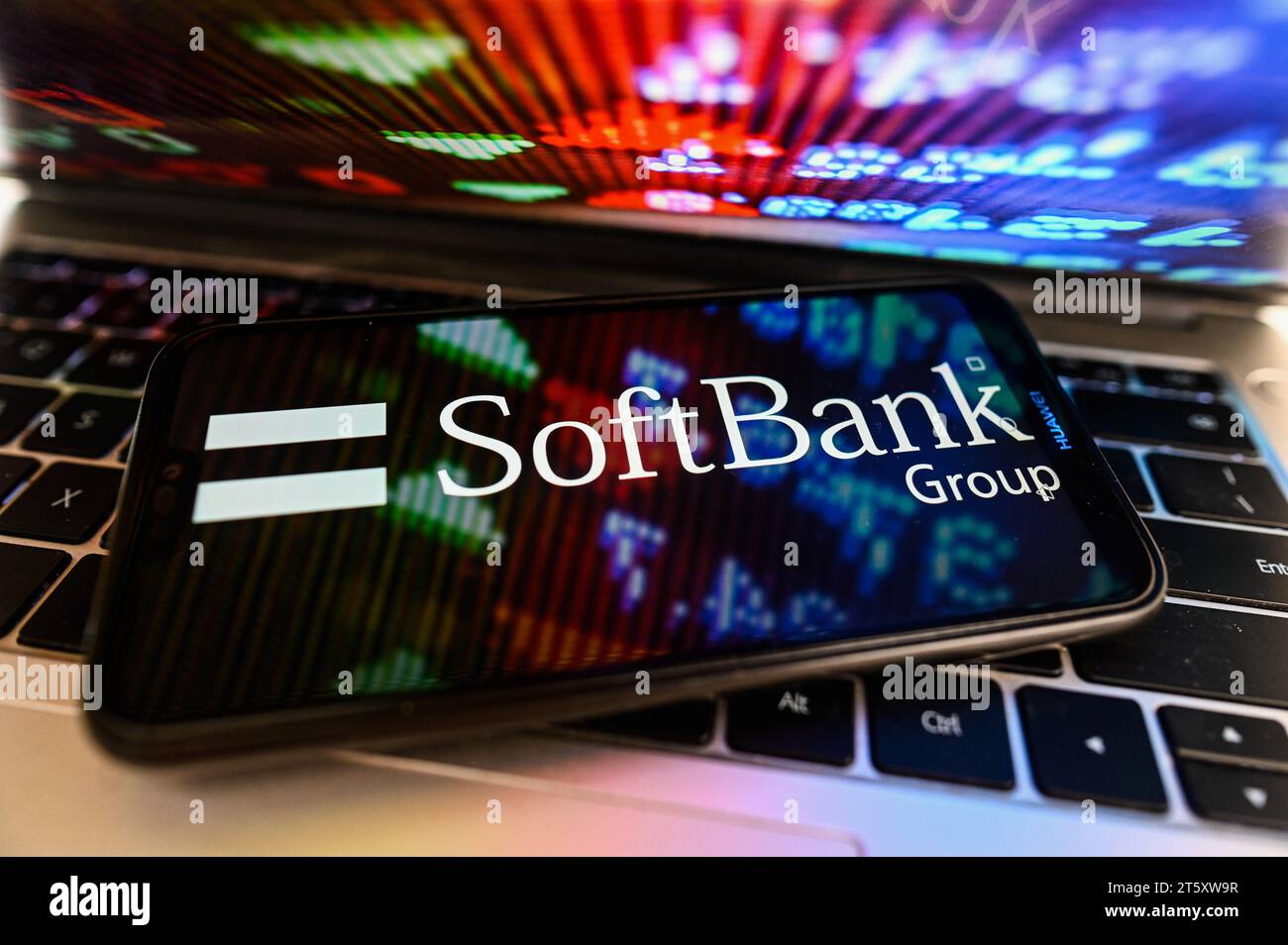 In this photo illustration, a SoftBank logo is displayed on a ...