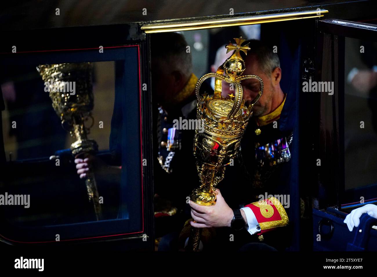 The ceremonial mace arrives at the Sovereign's Entrance to the Palace ...