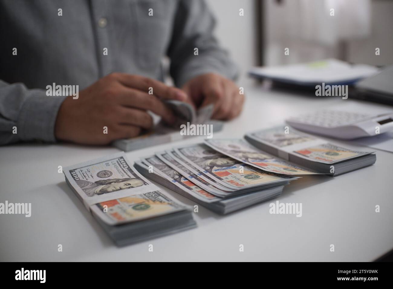 Unrecognisable businessman, accountant, banker counting money at the ...