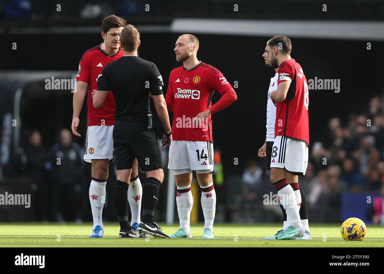 Harry Maguire & Christian Eriksen of Manchester United complain to the ...