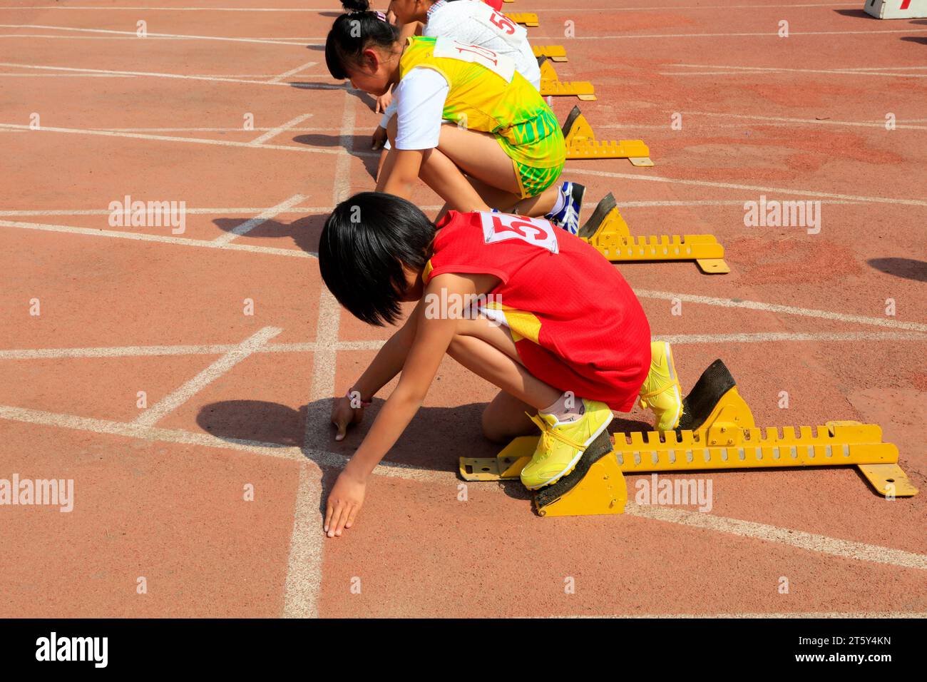 Sprinter's preparatory position Stock Photo - Alamy