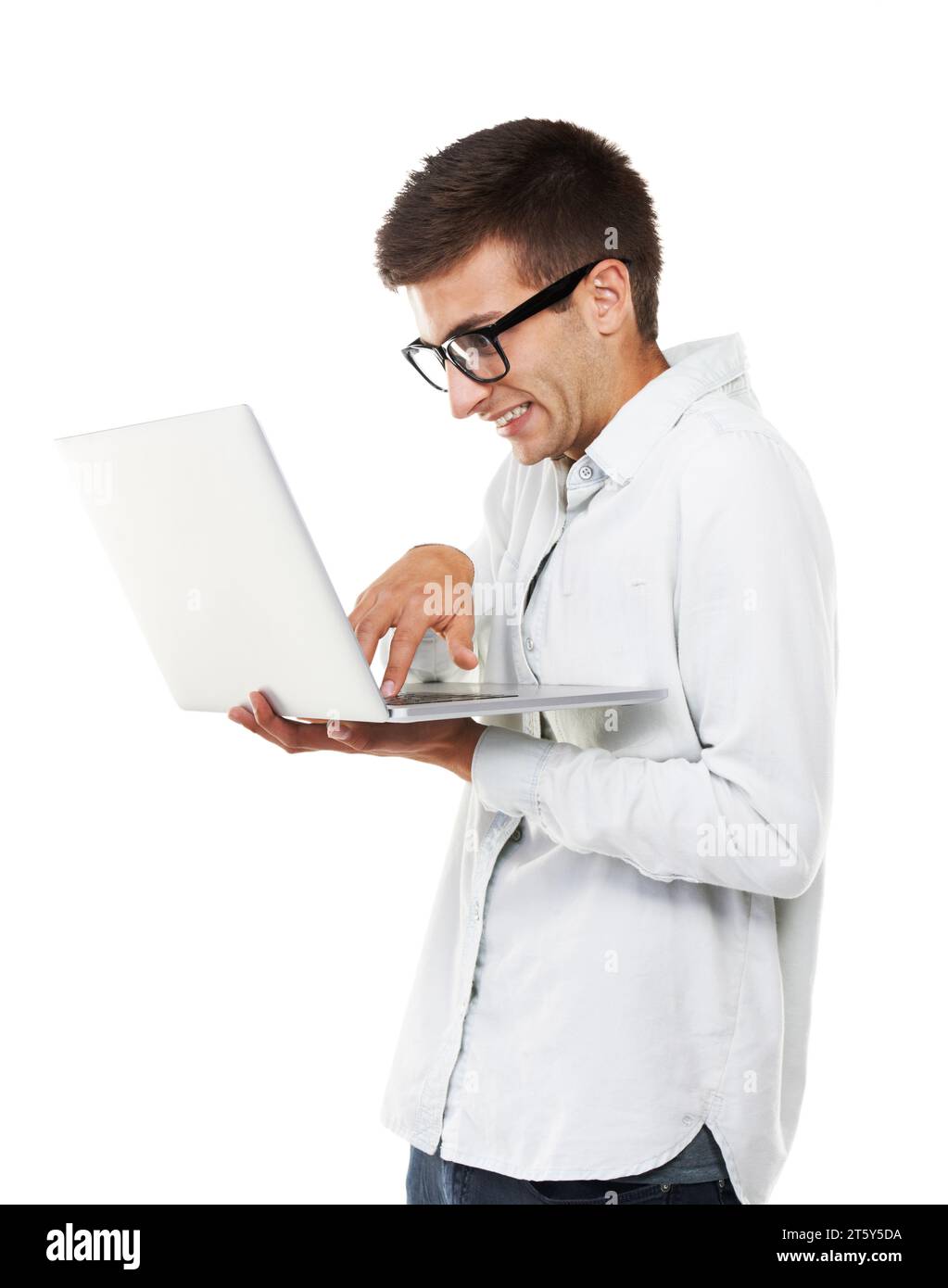 Geek, business man typing on laptop and isolated on a white background ...