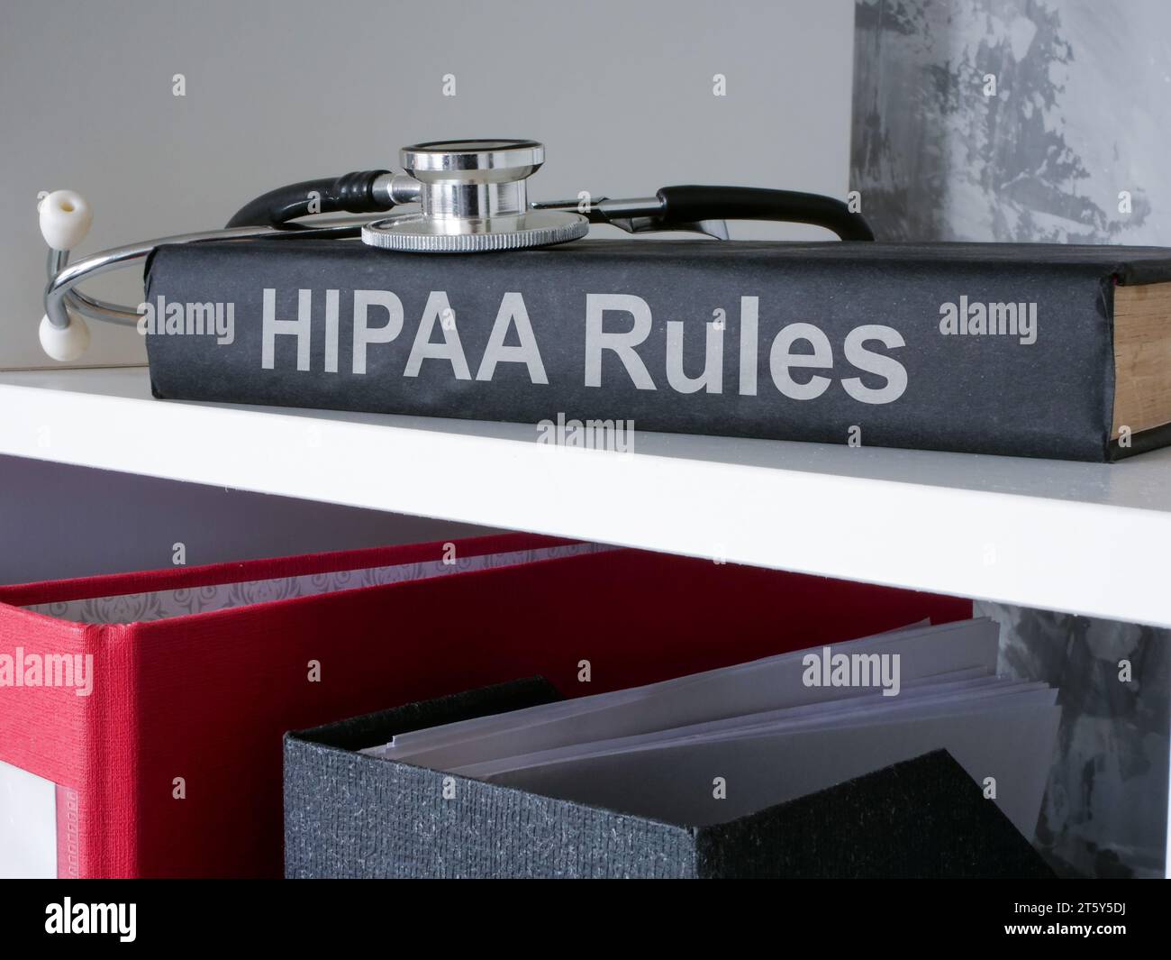 HIPAA rules with stethoscope on the shelf Stock Photo - Alamy