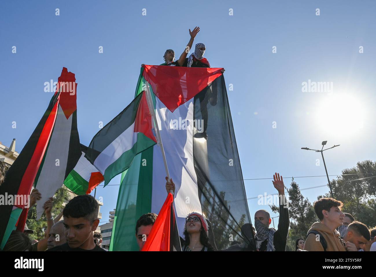 Athens, Greece. 5th Nov 2023. Participants wave Palestinian flags and ...