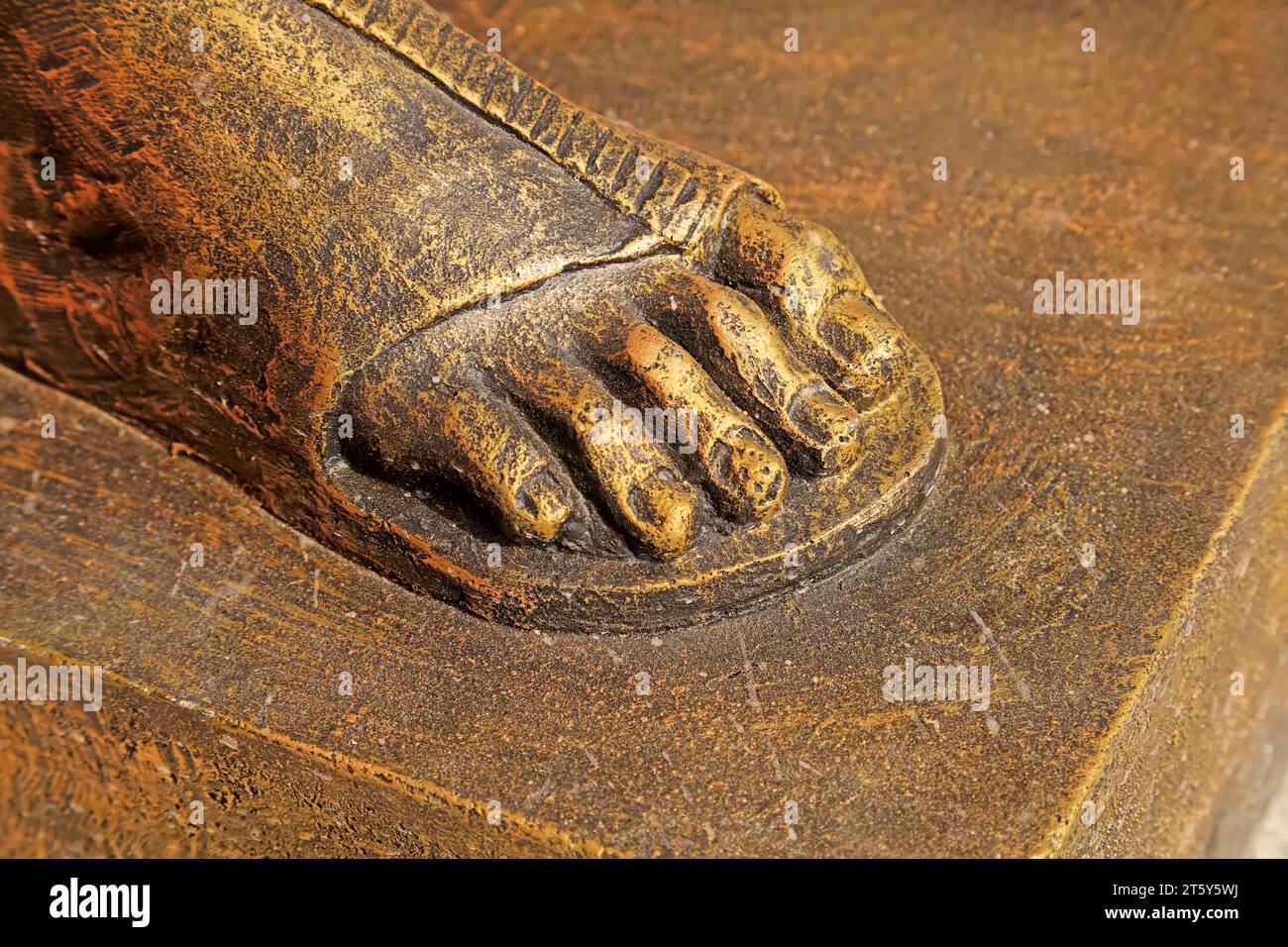toe of copper sculpture Stock Photo - Alamy