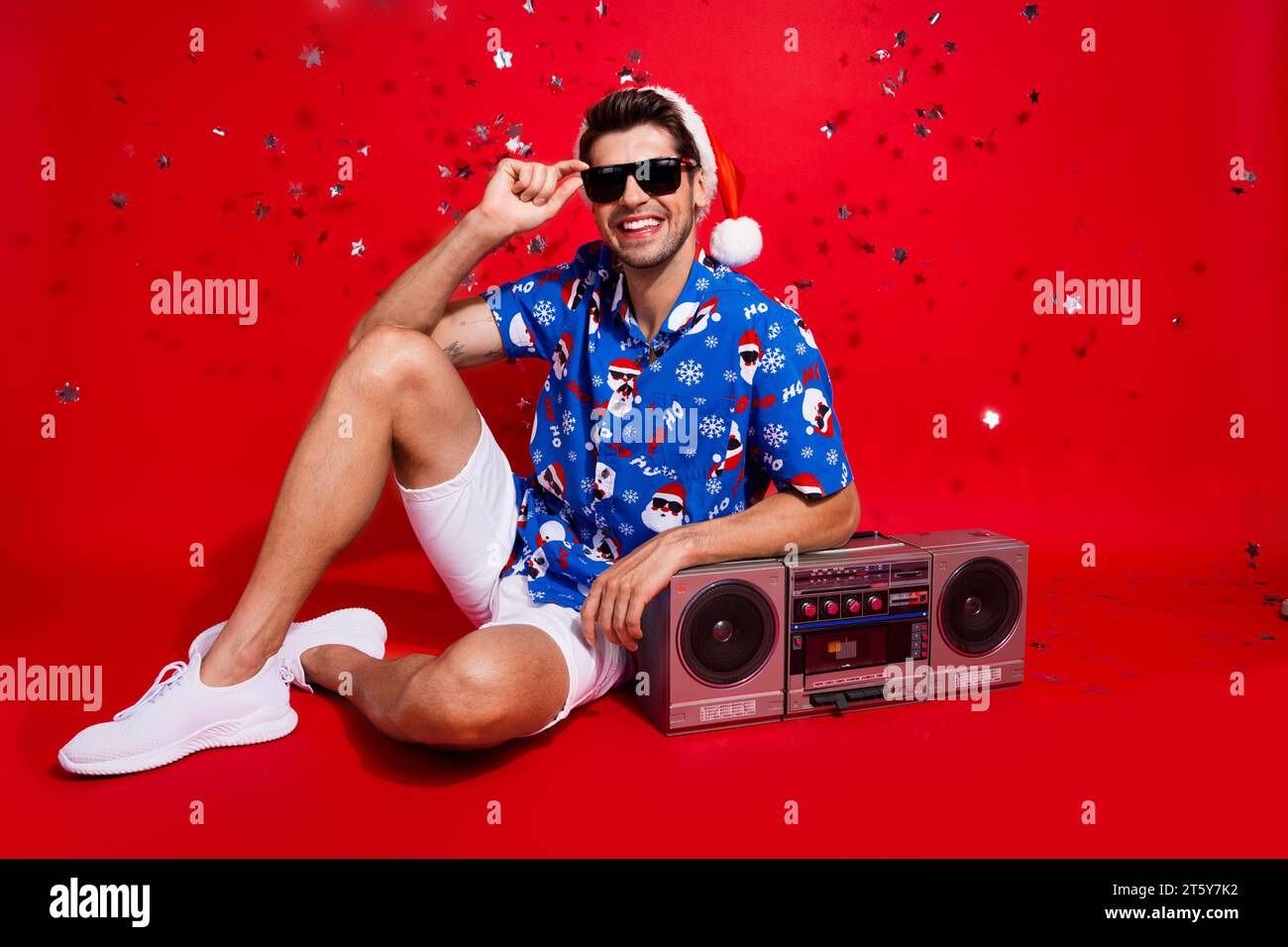 Full size photo of funky young man boom box party touch sunglass ...