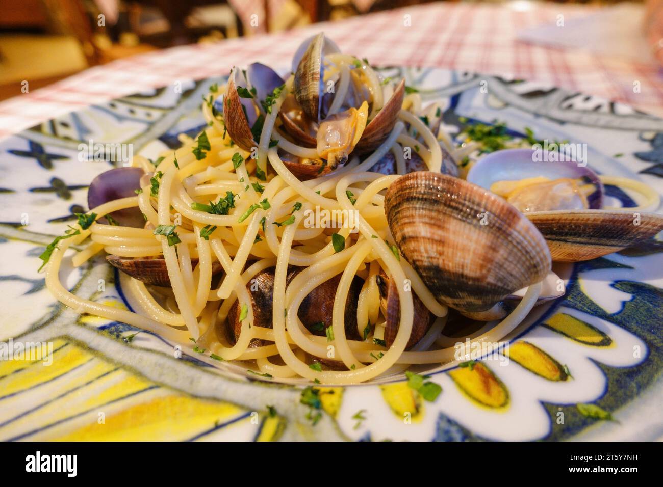 Continental dish of spaghetti alle vongole containing Clams and ...