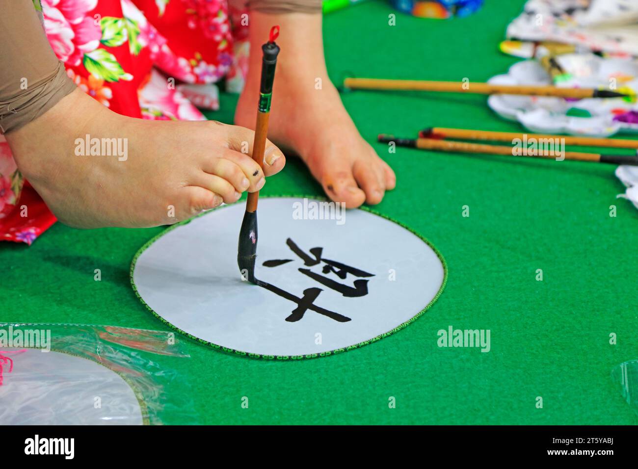 Barefoot woman painting nails hi-res stock photography and images - Alamy