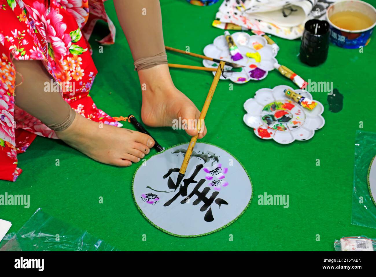 Barefoot woman painting nails hi-res stock photography and images - Alamy
