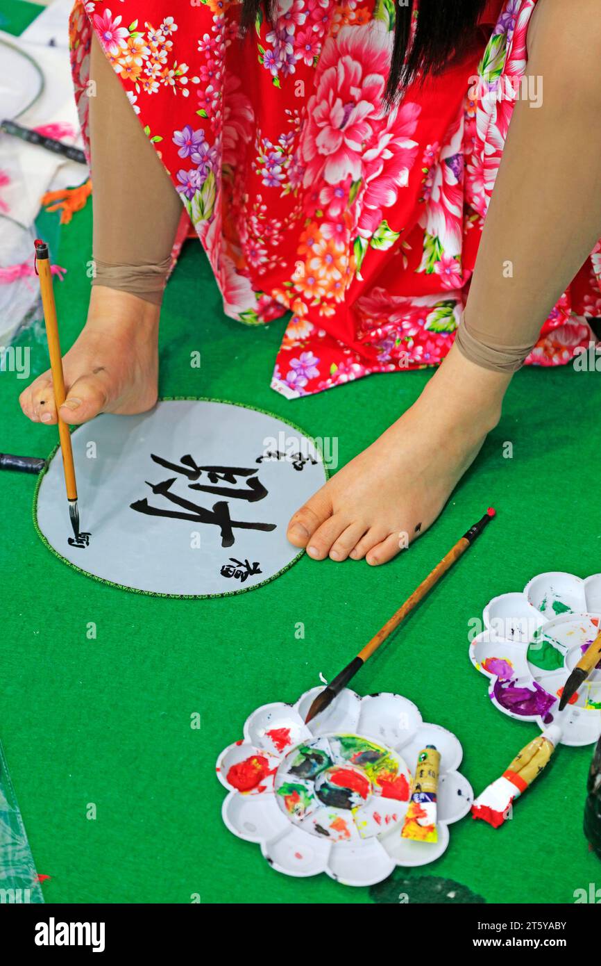 Barefoot woman painting nails hi-res stock photography and images - Alamy
