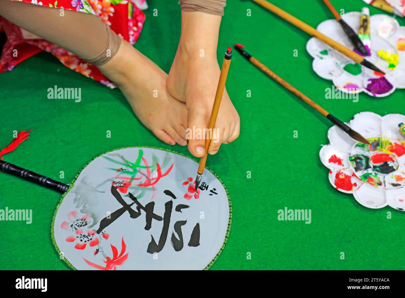 Barefoot woman painting nails hi-res stock photography and images - Alamy