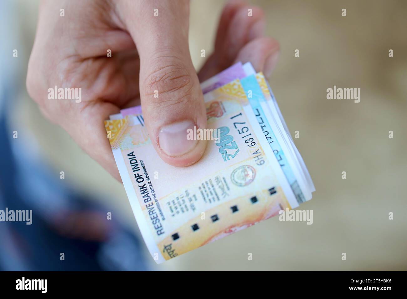Man hand with indian rupees bills close up. Concept of financial ...