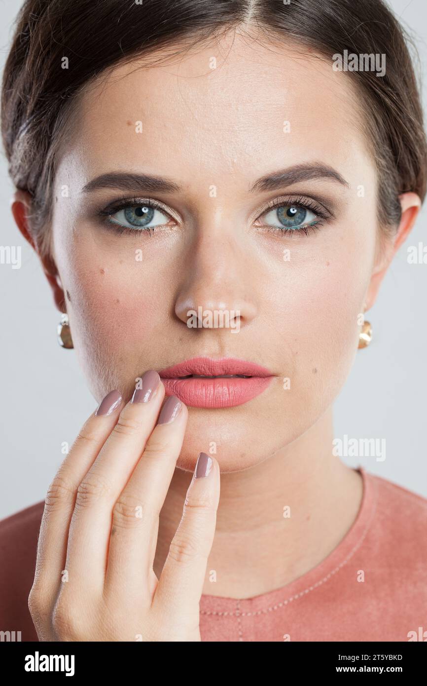 Young brunette. Beautiful model woman with healthy real skin and wavy ...