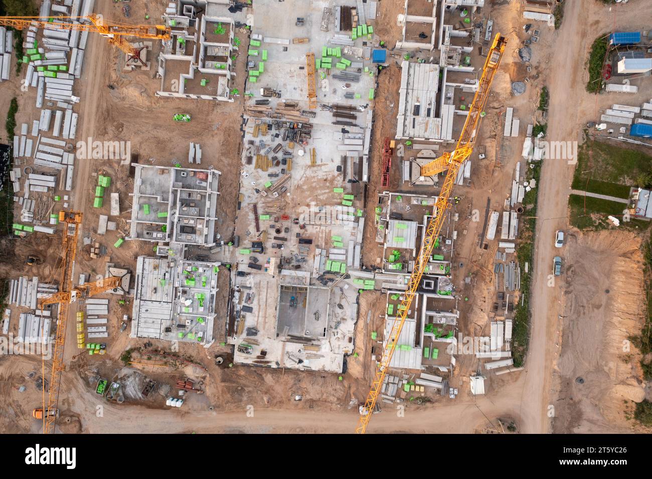 Drone photography construction site of new buildings during autumn dusk ...