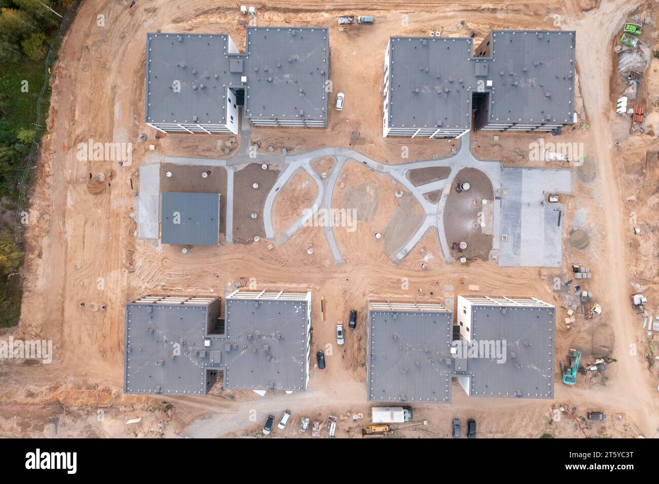 Drone photography construction site of new buildings during autumn dusk ...