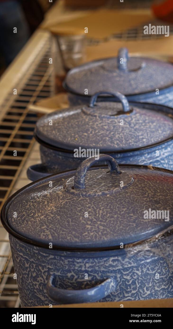 large blue food containers lined up Stock Photo - Alamy