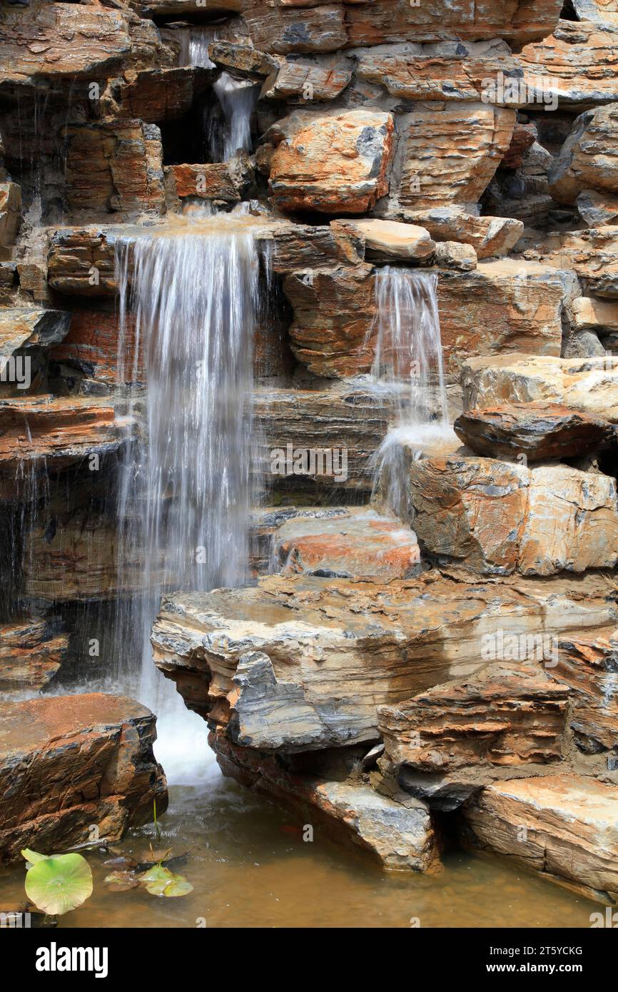 Fake rock waterfall, closeup of photo Stock Photo - Alamy