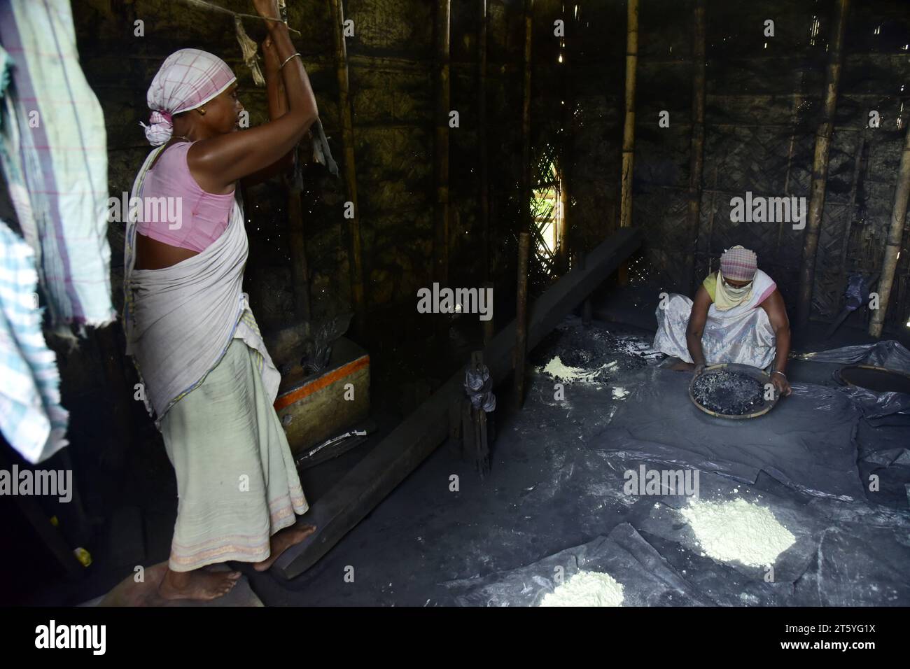 November 5, 2023, Guwahati, Guwahati, India: Village woman grinding ...