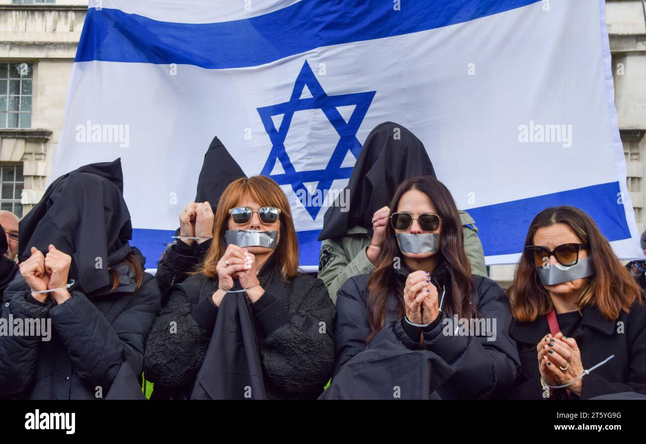 London, England, UK. 7th Nov, 2023. Protesters have their hands tied ...