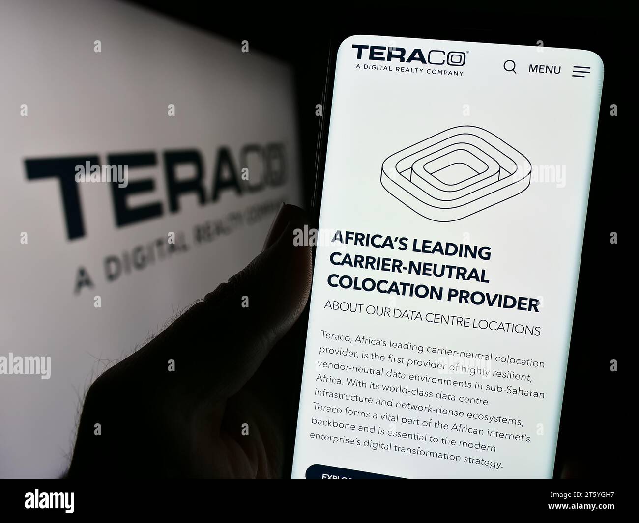 Person holding cellphone with webpage of South African company Teraco ...