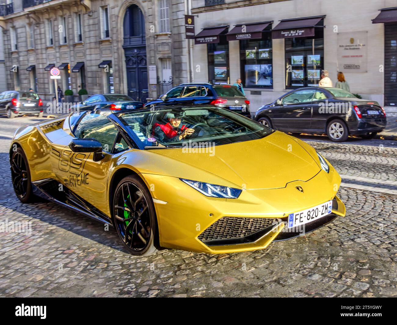 Lamborghini Spyder self-drive hire car on a Parisian cobbled street ...