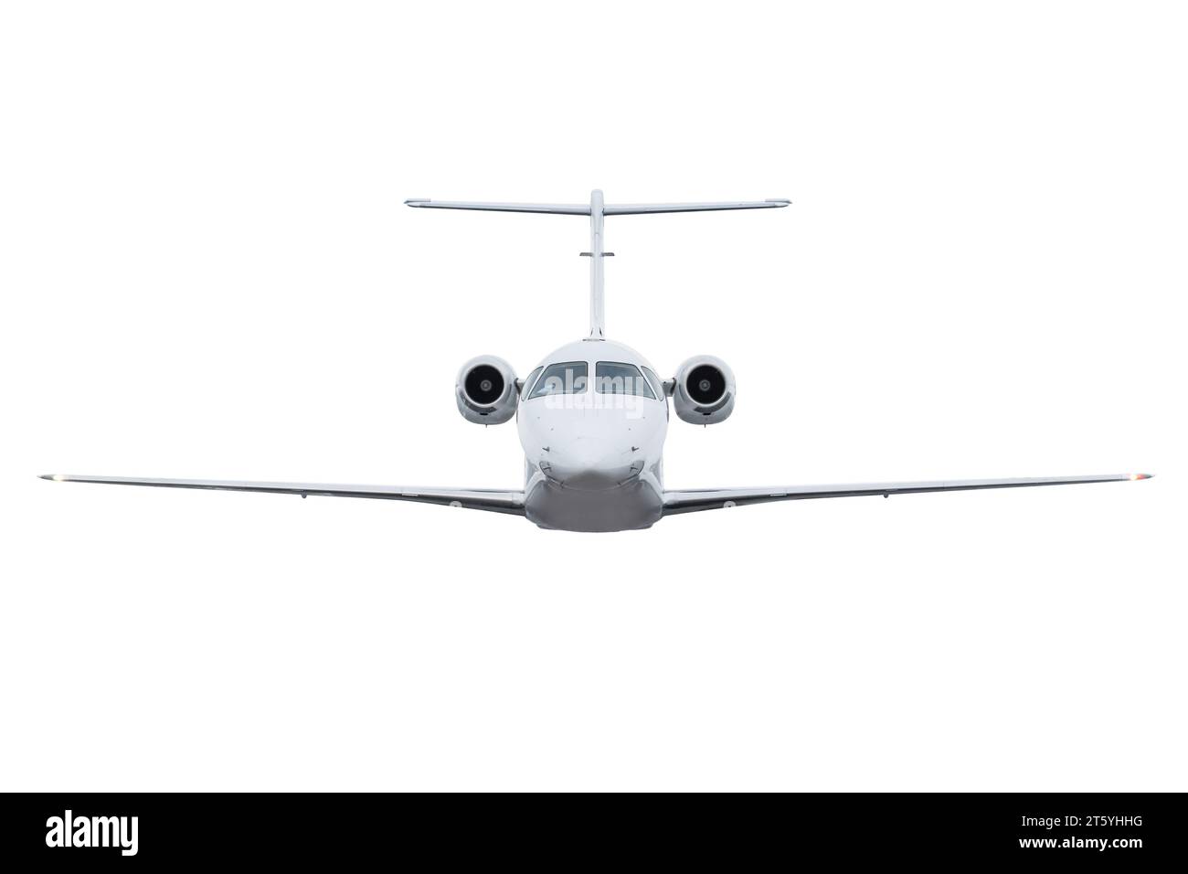 Front view of the corporate business jet flying isolated on white ...
