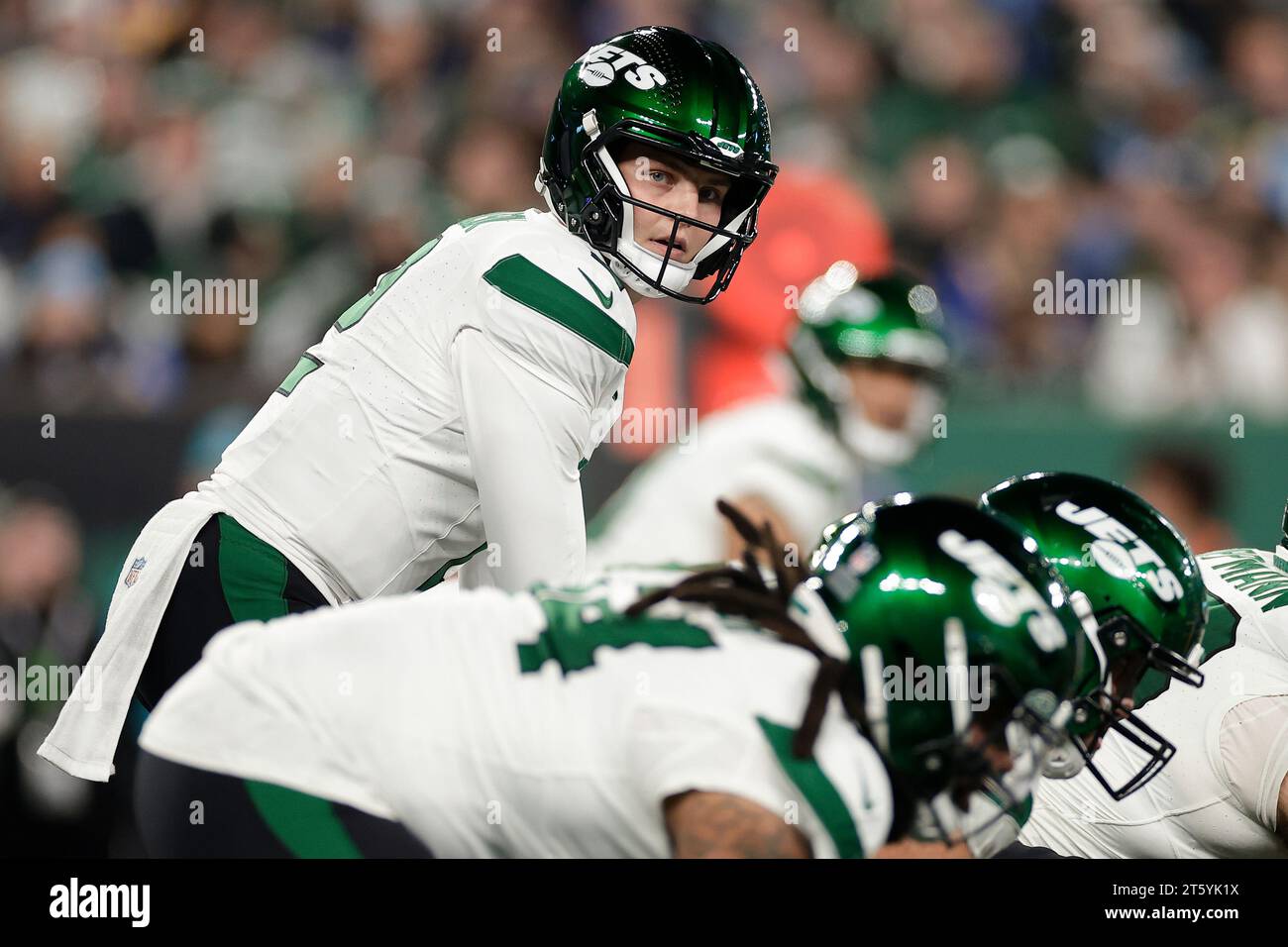 New York Jets quarterback Zach Wilson (2) calls an audible at the line ...