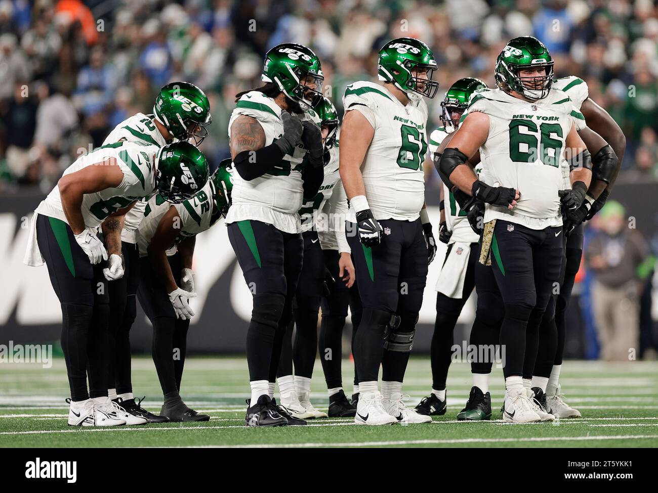 New York Jets center Joe Tippmann (66) stands at the line of scrimmage ...