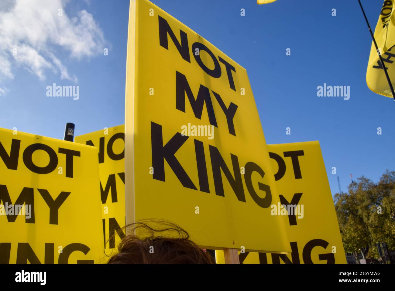 London, UK. 7th November 2023. Protesters hold up Not My King placards ...