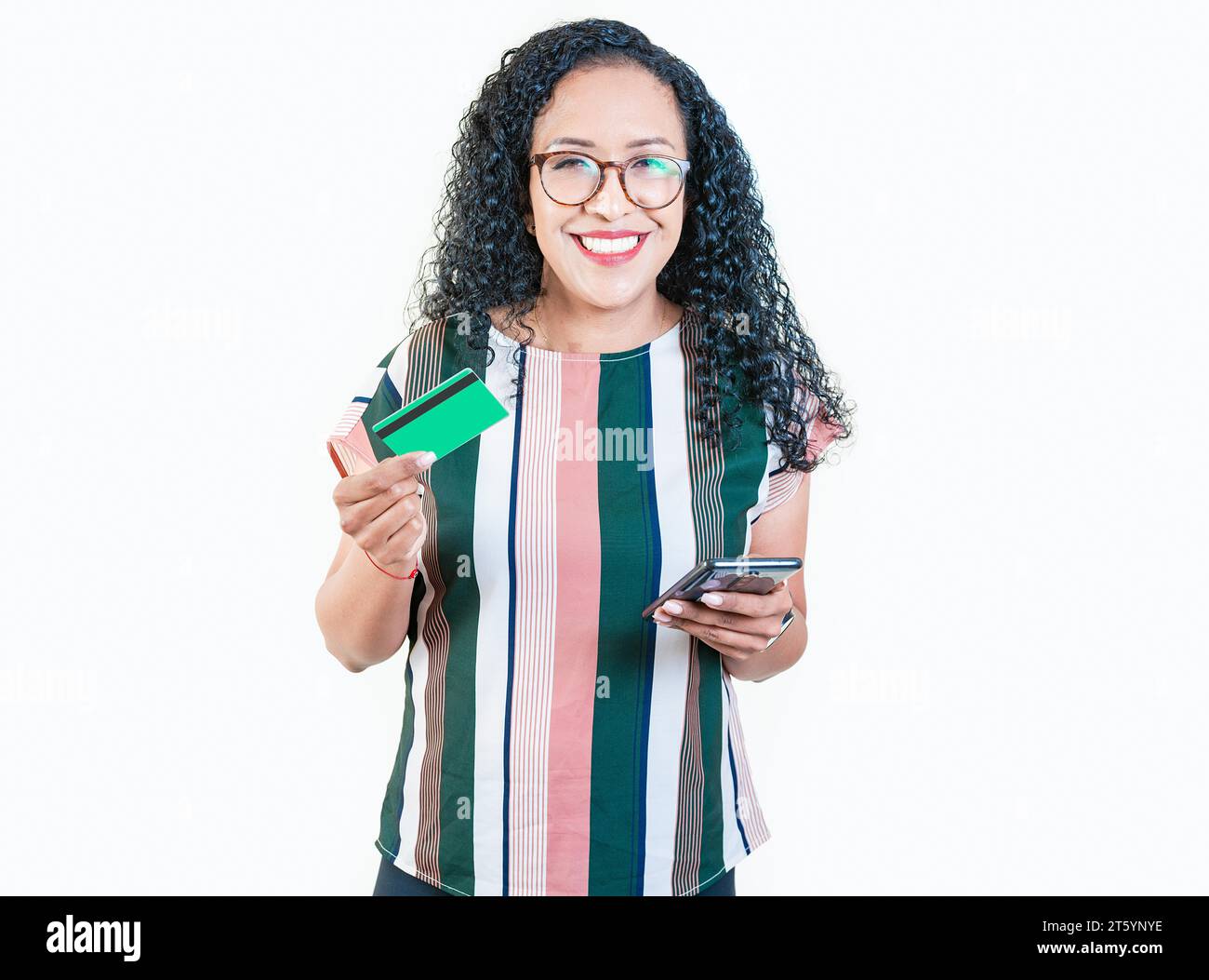 Happy young woman making online purchases with cell phones and credit ...