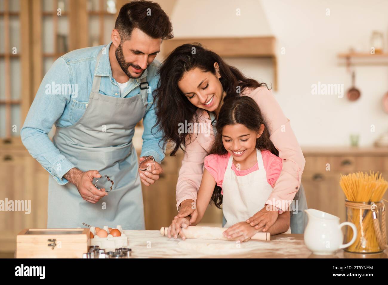 Family baking together in the kitchen Stock Photo - Alamy