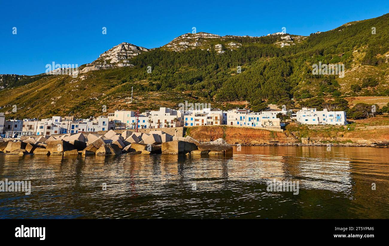 Concrete breakwater, White houses, Wooded hillside, Mountain, Morning ...