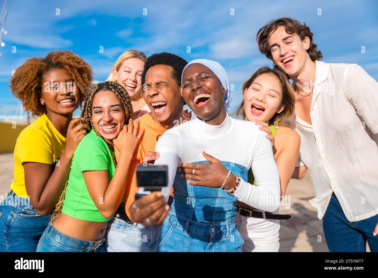 Muslim African Woman Taking A Selfie While Laughing With Multi Ethnic