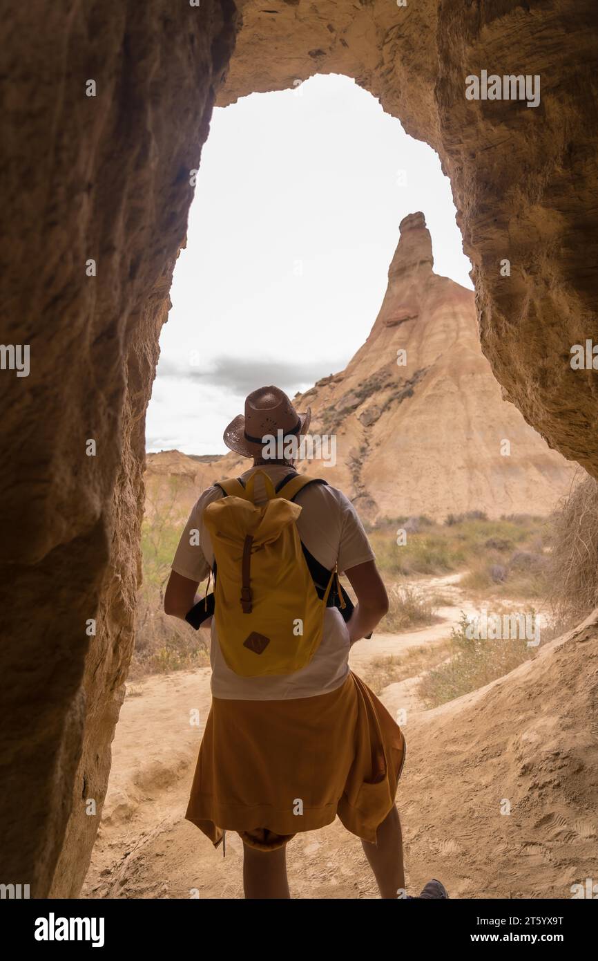 Vertical photo of the rear view of an explorer in the desert Stock ...