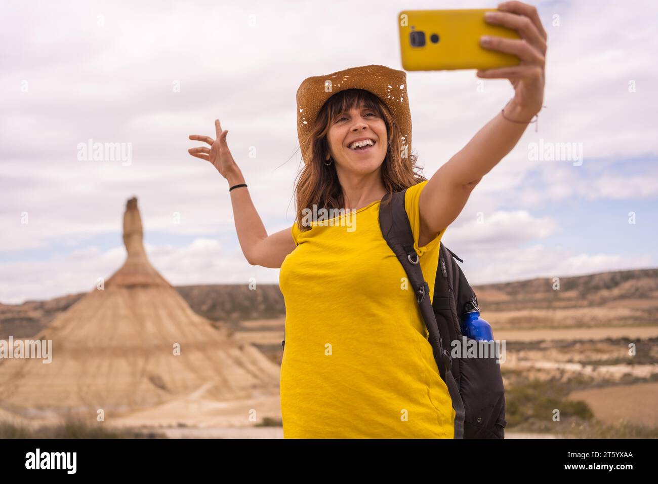 Horizontal photo with copy space of a woman taking a selfie during a ...