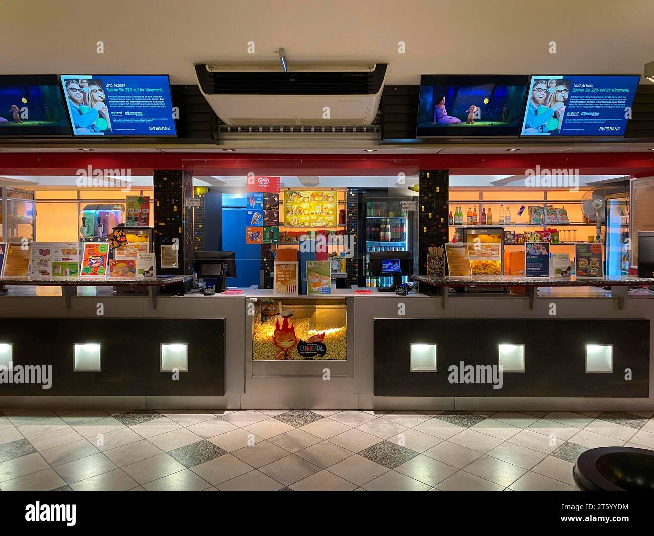 Interior shot kiosk, point of sale in a cinema, food, popcorn, nachos ...
