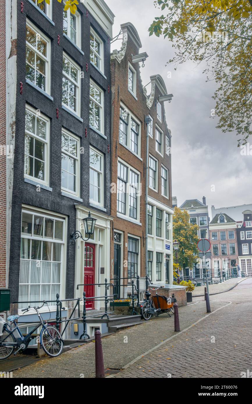 Netherlands. Sunny day in Amsterdam. Sloping facades of authentic Dutch ...