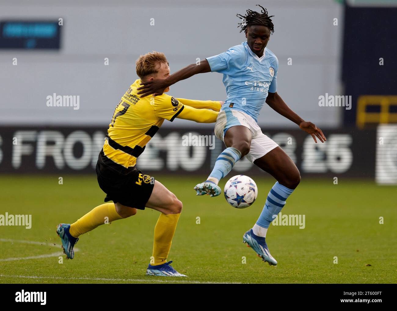 BSC Young Boys' Ryan Wyss (left) and Manchester City's Mahamadou Susoho ...