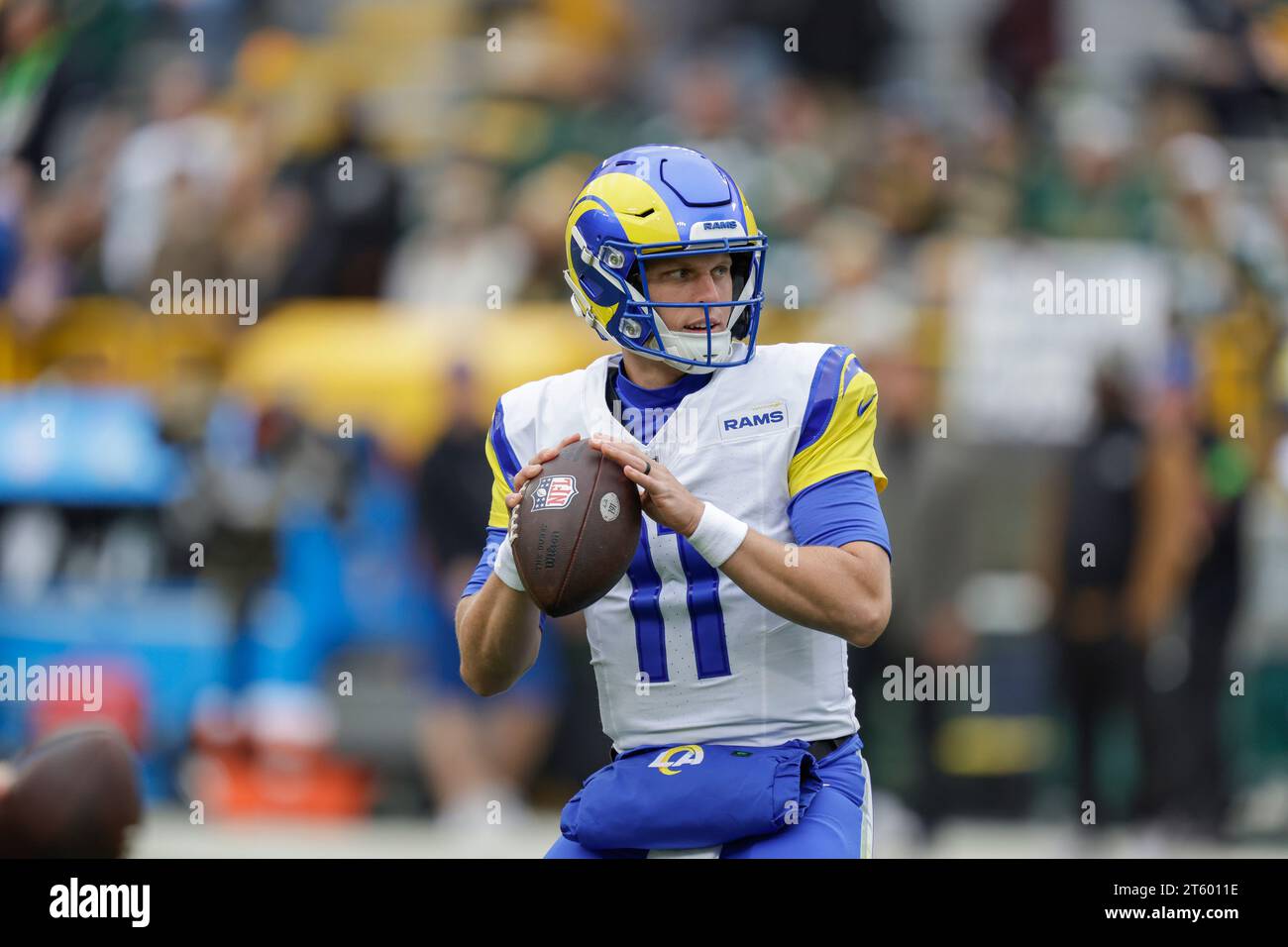 Los Angeles Rams quarterback Brett Rypien (11) throws passes in warm ...