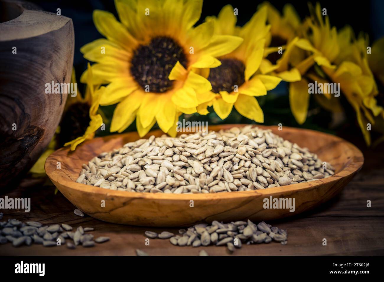 Sunflower Helianthus annuus Seeds on olive wood Stock Photo - Alamy