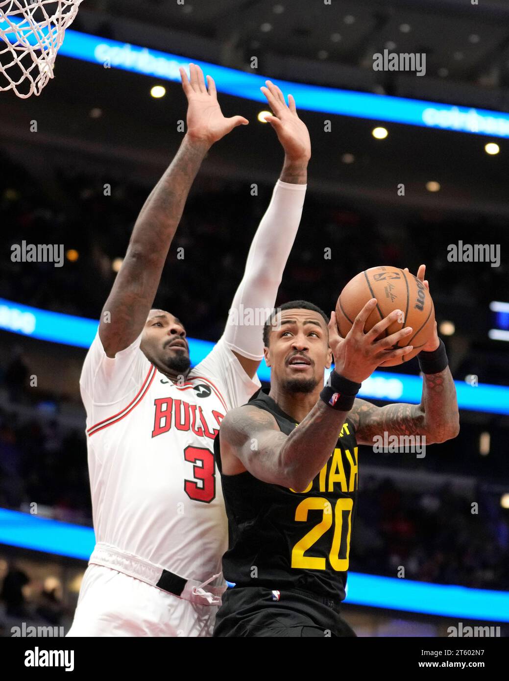 Utah Jazz's John Collins drives to the basket as Chicago Bulls' Andre ...