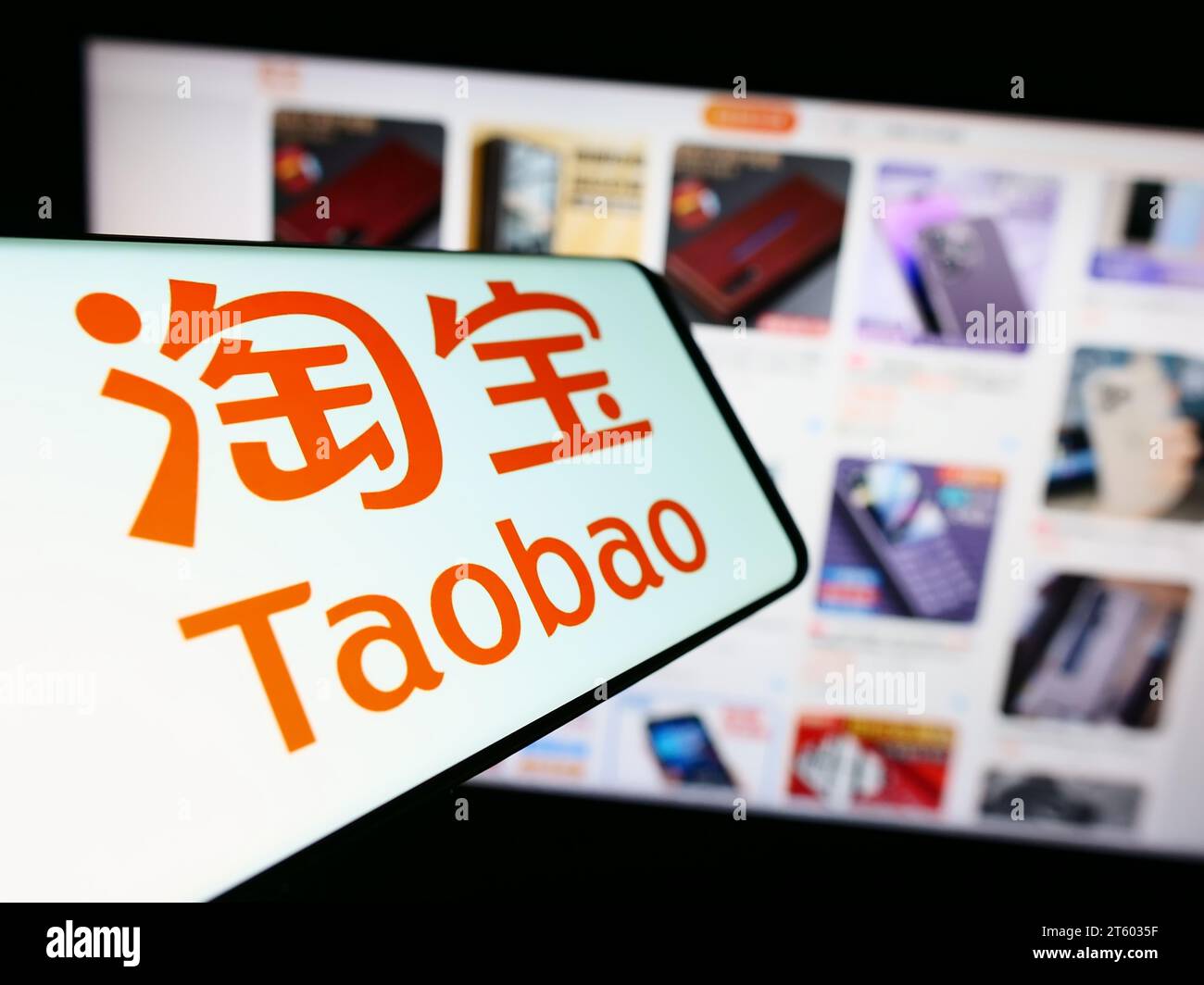 Smartphone with logo of Chinese online shop Taobao (Alibaba Group) in ...