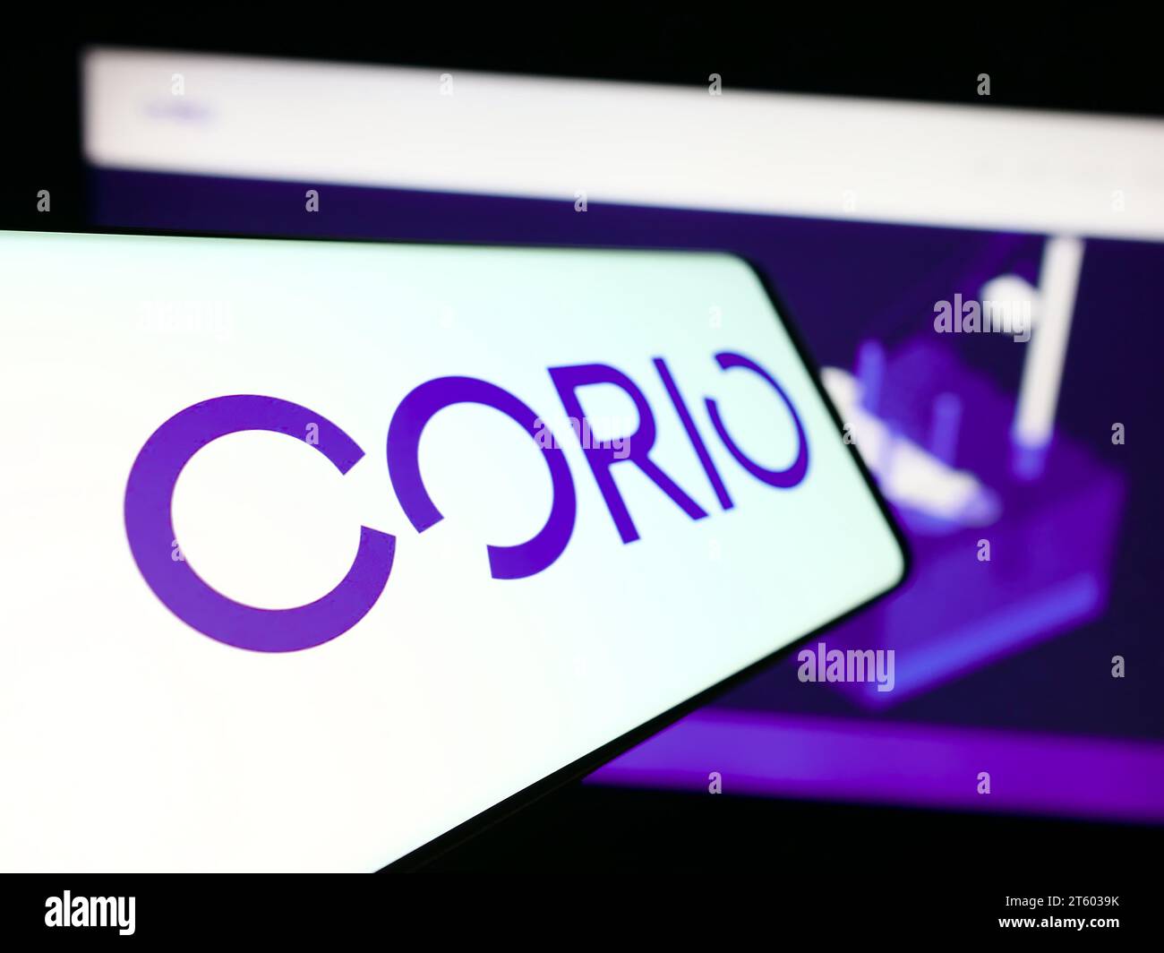 Mobile phone with logo of renewables investment company Corio ...