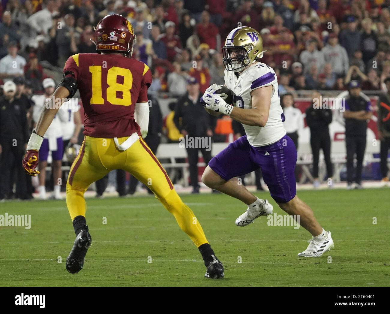 Washington Huskies running back Jack Westover (37) makes a play with ...