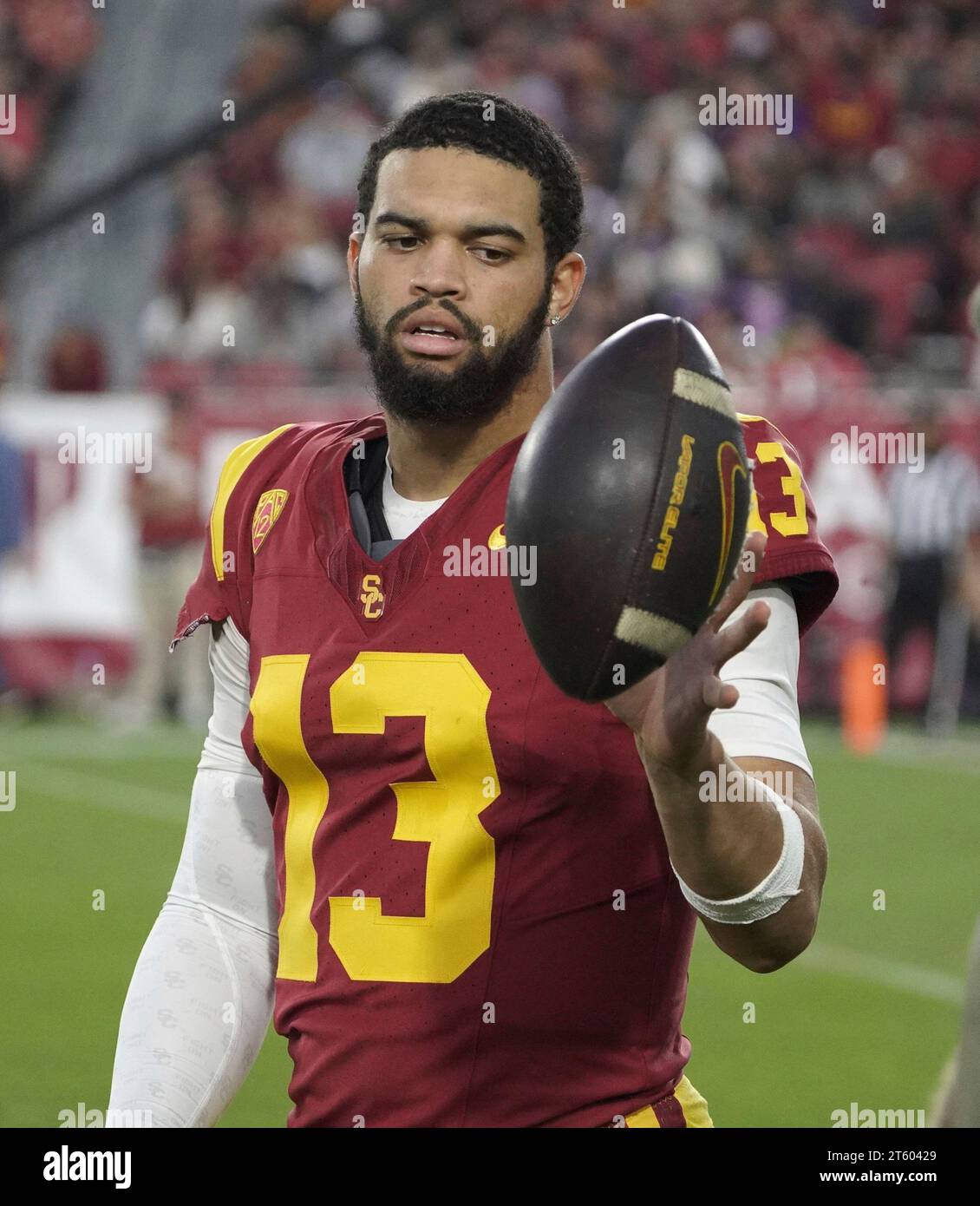 USC Trojans quarterback Caleb Williams (13) works out with the football ...