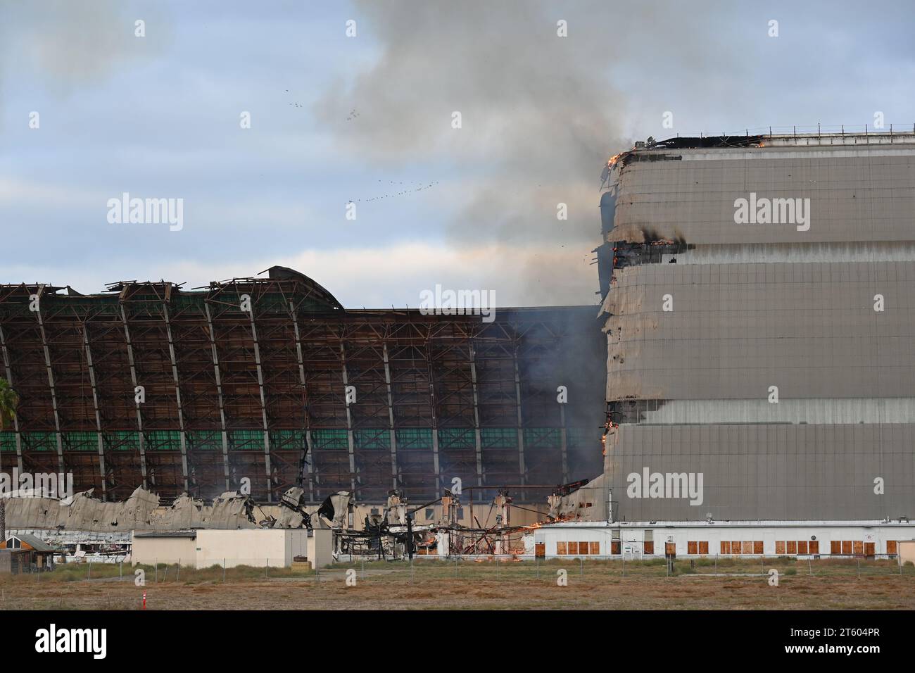 TUSTIN, CALIFORNIA - 7 NOV 2023: The MCAS Tustin Blimp Hangar on fire ...